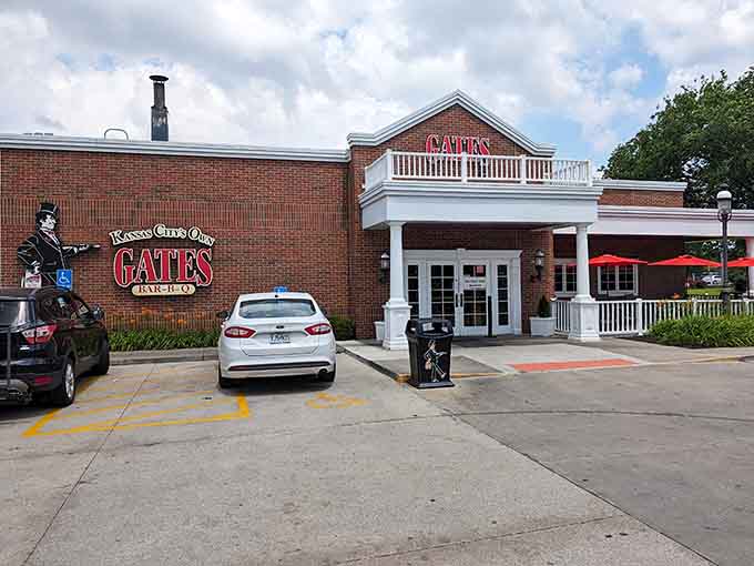 That classic brick facade and dapper gentleman logo tell you everything: serious barbecue lives here.