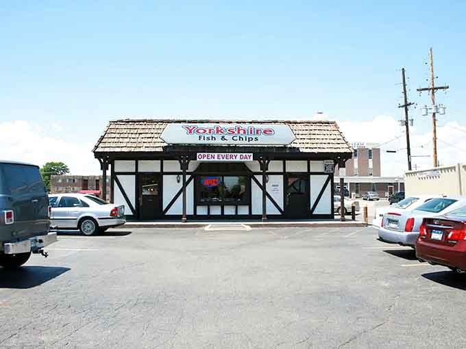 The Tudor-style facade of Yorkshire Fish & Chips stands like a British embassy on Denver soil, promising authentic flavors beneath its distinctive black-and-white timber framing.