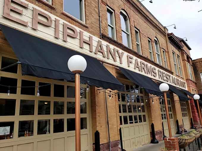 That classic storefront with the green awning practically whispers "something special happens here" to anyone walking by downtown.