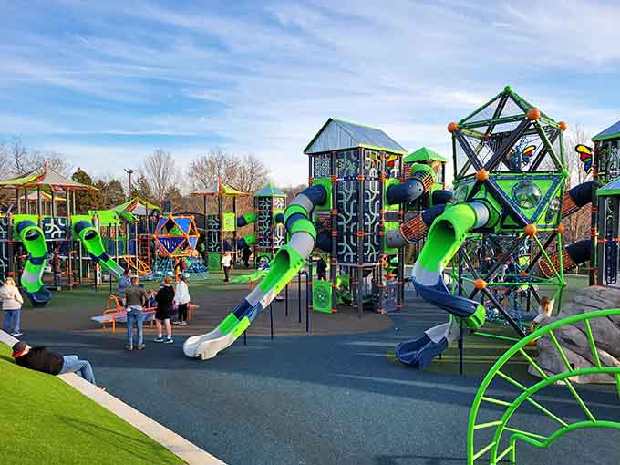 Those twisting tube slides in electric green look like they escaped from a candy factory's fever dream.