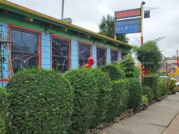 That turquoise and yellow exterior isn't whispering its presence, it's singing an aria to anyone within three blocks.