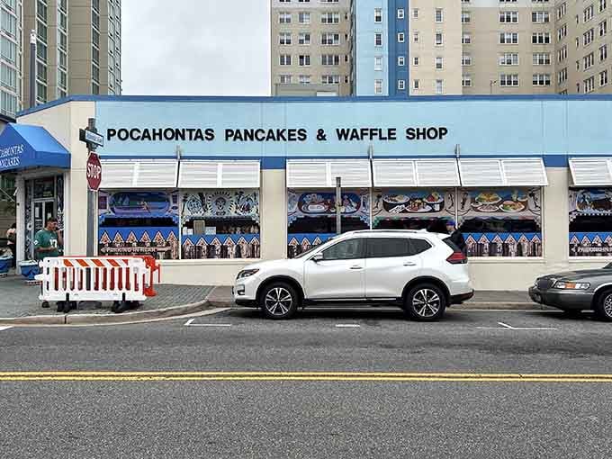 That blue and white facade isn't trying to blend in with anything, and honestly, we should all be that confident.