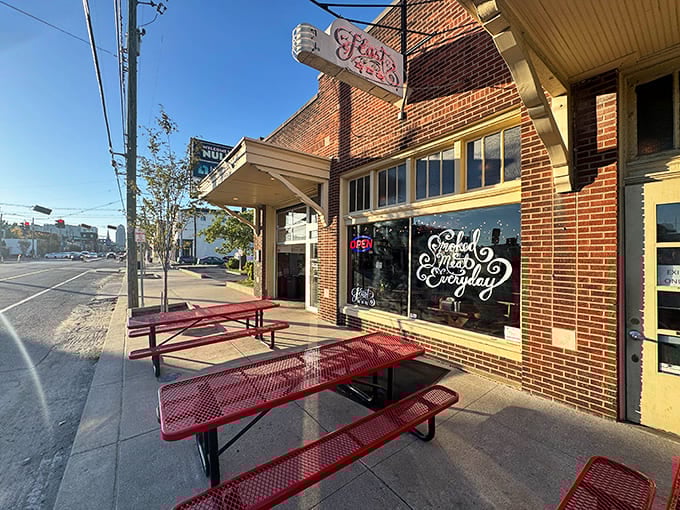 Those cherry-red picnic tables outside are calling your name like a BBQ siren song you can't resist.