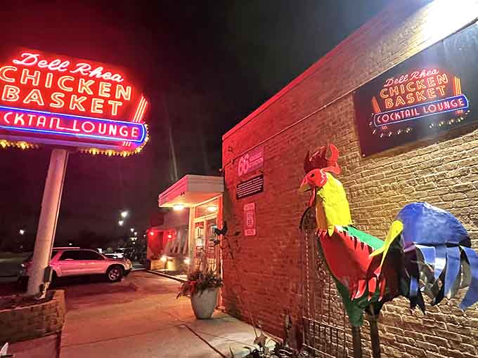 That neon glow isn't just a sign, it's a beacon calling hungry souls home to fried chicken paradise.