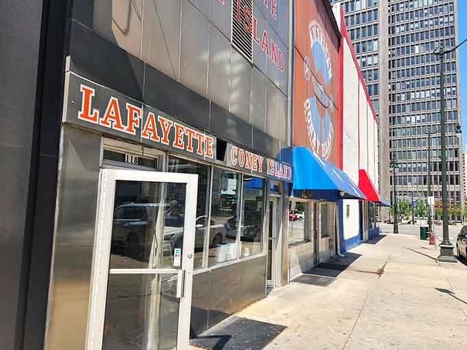 That bold orange signage against downtown Detroit's skyline has been calling hungry souls for generations of coney devotion.