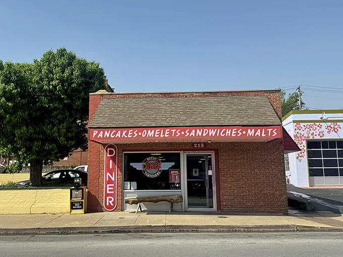 The vertical "DINER" sign catches your eye from blocks away, promising comfort food and zero pretension inside.