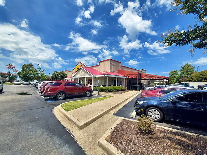 A full parking lot tells the real story&mdash;locals know where the good stuff is. Under brilliant blue skies, this barbecue haven draws crowds like a Southern magnet.