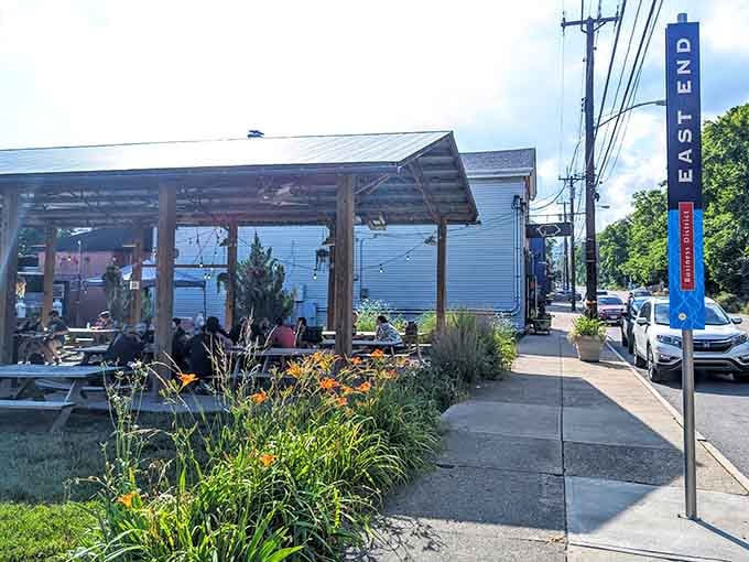 From the street, you can see a covered patio with ample picnic table seating, perfect for enjoying Ohio summer evenings.