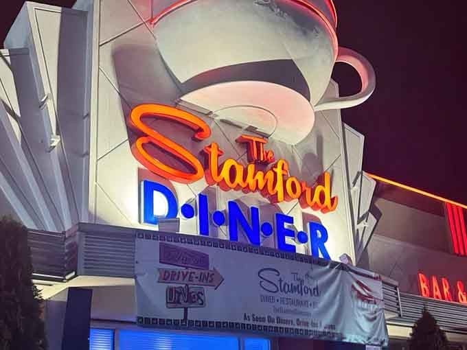 The Stamford Diner's gleaming exterior stands ready for its close-up, like a 1950s movie star who's aged gracefully and still knows how to draw a crowd.