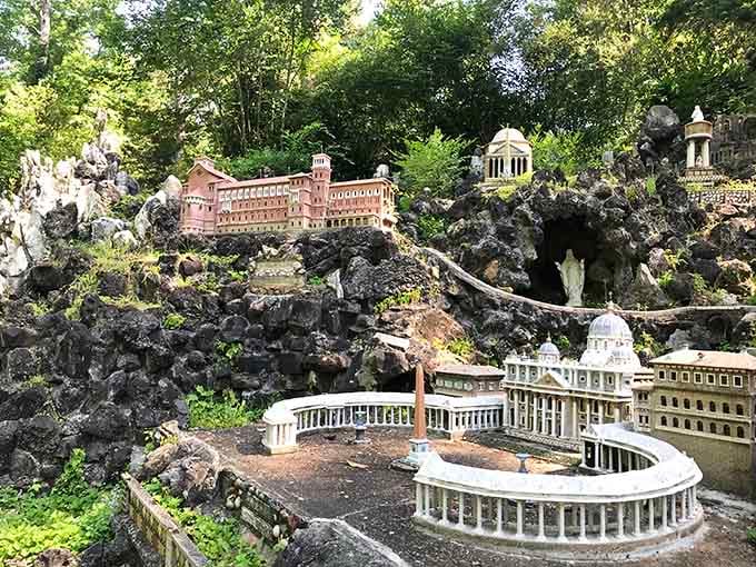 Miniature masterpieces cascade down the hillside like a tiny European vacation without the jet lag or passport drama.