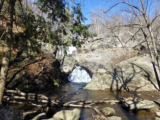 The falls cascade gently over ancient rocks, creating a soundtrack that's better than any meditation app.