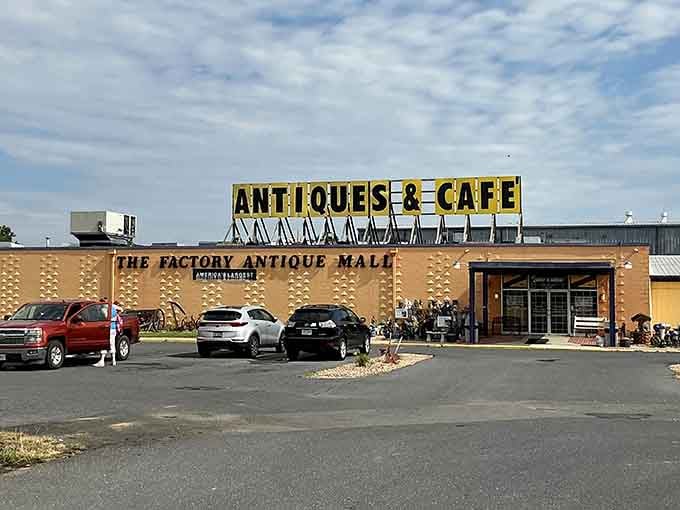 The Factory Antique Mall's exterior promises exactly what's inside: a sprawling wonderland where parking spots are precious currency.