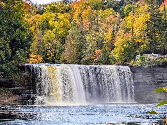 That amber glow isn't a filter, it's pure Upper Peninsula magic cascading over ancient rock formations.