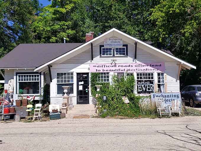 The charming facade of Enchanting Objects welcomes treasure hunters with a philosophical banner that perfectly captures the thrill of antiquing adventures.