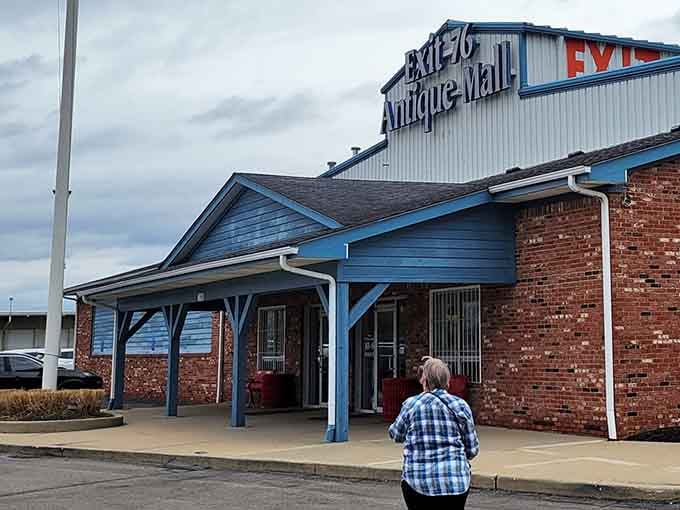 The blue-trimmed brick facade of Exit 76 Antique Mall beckons like a siren call to treasure hunters traveling along I-65.