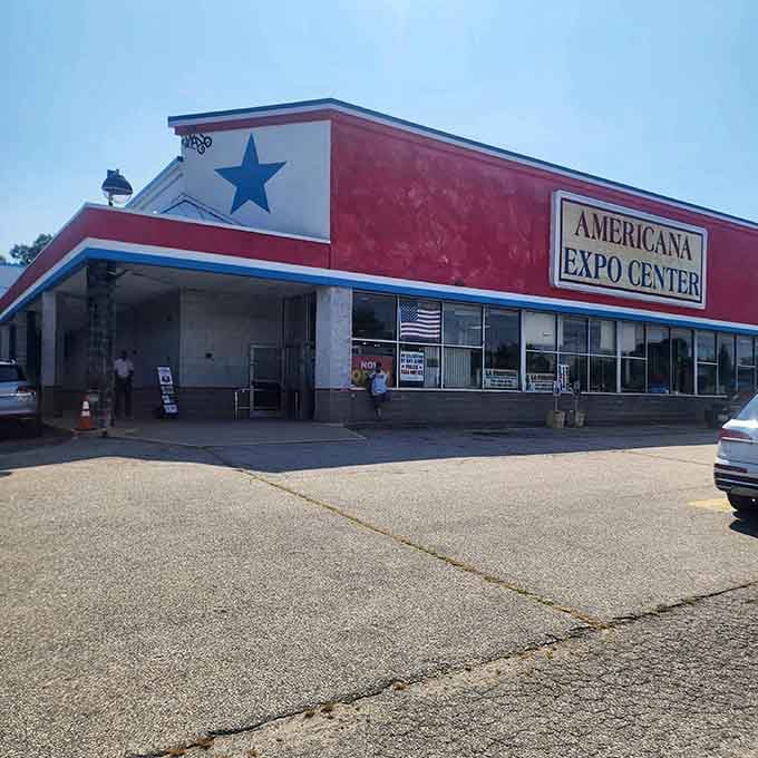 The patriotic red, white, and blue exterior of Americana Expo Center stands like a retail Statue of Liberty, beckoning bargain hunters to its treasure-filled halls.