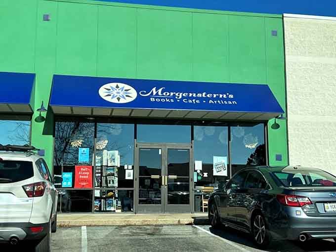 That cheerful green and blue exterior isn't just inviting, it's practically begging you to come inside and browse.