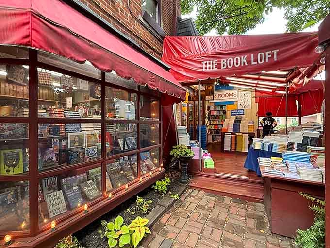 The outdoor entrance area welcomes browsers with brick pathways and the promise of discovering your next favorite read inside.