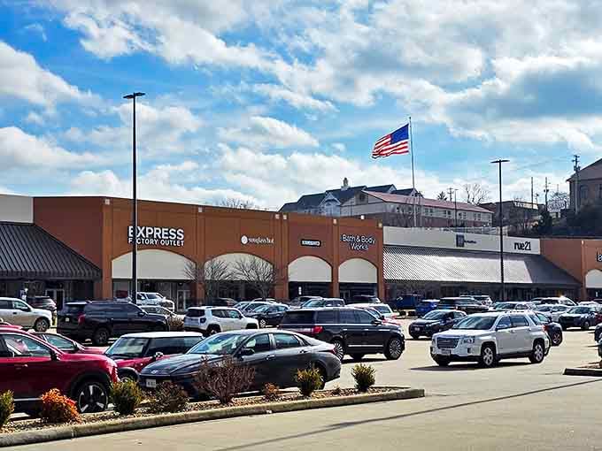 Express, Bath & Body Works, and more line this bustling section of Tanger Outlets under Missouri's beautiful sky.