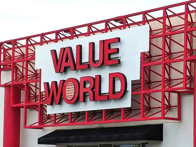 That bold red framework announces bargains like a lighthouse guides ships to shore, impossible to miss.