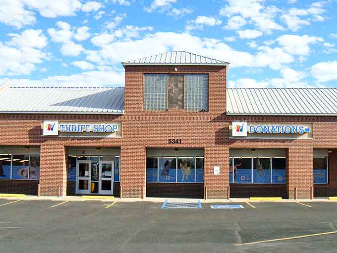 The unassuming brick exterior of Animal Humane Thrift Shop houses a wonderland of bargains where every purchase helps furry friends find forever homes.