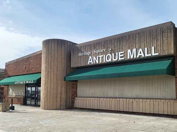 The unassuming exterior of Heritage Square Antique Mall hides a universe of treasures inside, like finding the Tardis of vintage shopping in suburban Ohio.