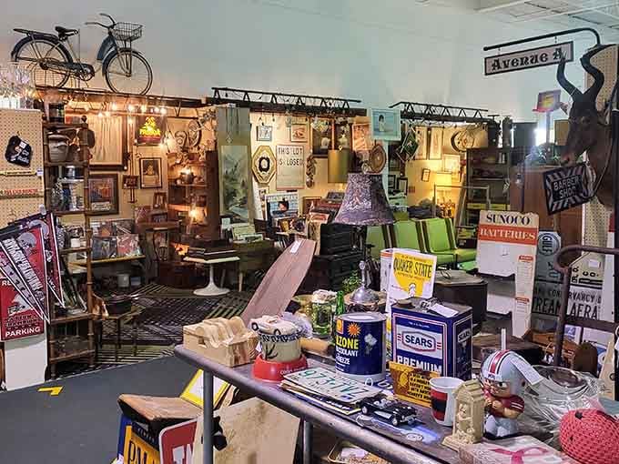 Organized chaos at its finest! From vintage Sunoco signs to retro bicycles hanging from the ceiling, this booth is like stepping into your coolest grandpa's garage.