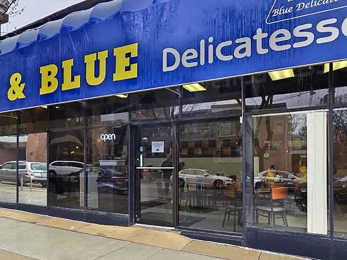 That blue awning isn't just decoration, it's a beacon calling hungry souls home to sandwich salvation.