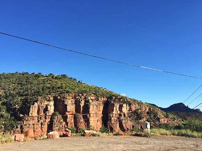 The approach to Red Rock State Park promises the kind of scenery that makes you question why you ever stayed indoors.