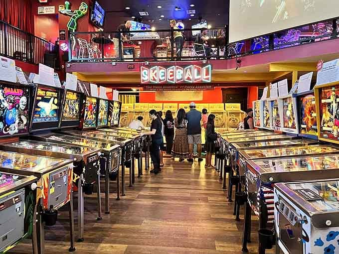 Visitors explore the incredible collection of pinball tables, each one offering a unique challenge and hours of nostalgic entertainment fun.
