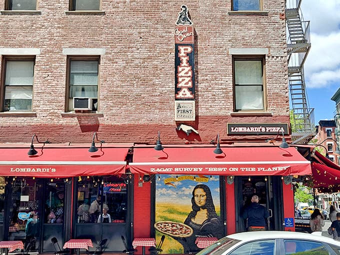 That red awning has been beckoning pizza pilgrims since before your grandparents' first date, and it still works.