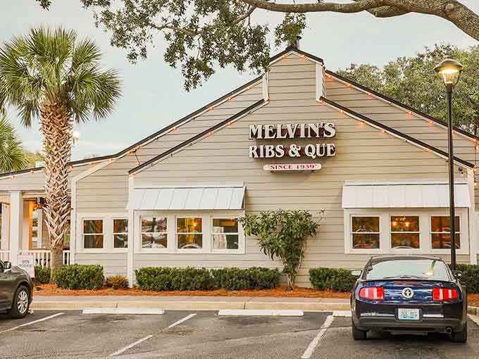 That cheerful exterior with the palm tree says "Southern hospitality" louder than a church bell on Sunday morning.