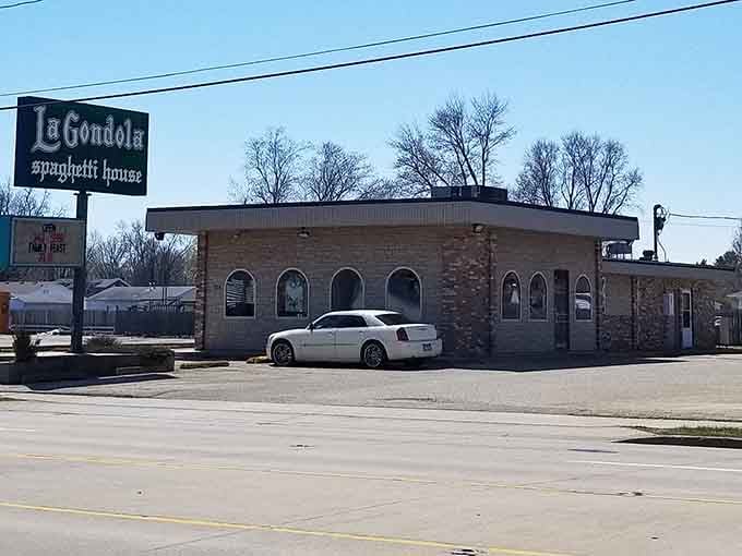 That classic sign and those arched windows promise exactly what's inside: serious Italian comfort food without the fuss.