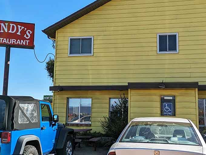 The iconic yellow siding and classic sign have welcomed hungry visitors for generations, a timeless landmark in a world of trendy food establishments.