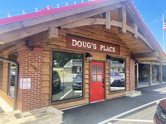 That red door isn't just an entrance, it's a portal to the best meat-and-three you'll find in Georgia.