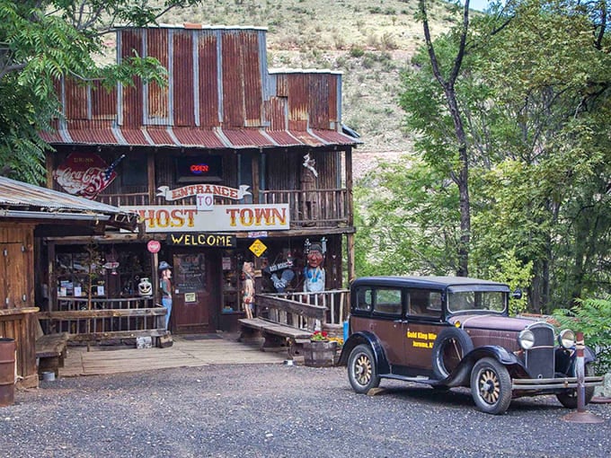 Ghost Town welcomes you with a vintage car and weathered charm that screams authentic Arizona adventure.