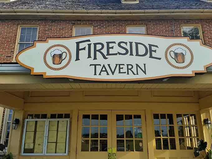 The tavern's sign features classic beer mug emblems, hinting at the craft brews and convivial atmosphere waiting inside this Strasburg gem.
