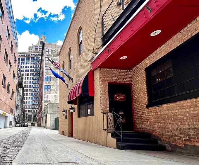 That unmarked entrance isn't trying to be trendy, it's genuinely committed to the whole secret agent thing.