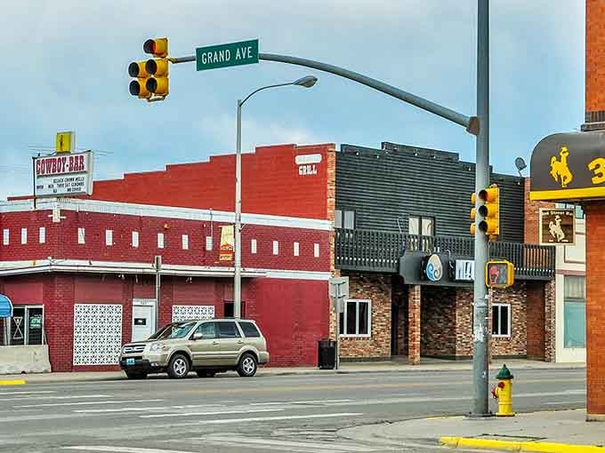 Grand Avenue welcomes you with small-town charm and big sky promise. The Cowboy Bar stands as a testament to Laramie's Western roots.