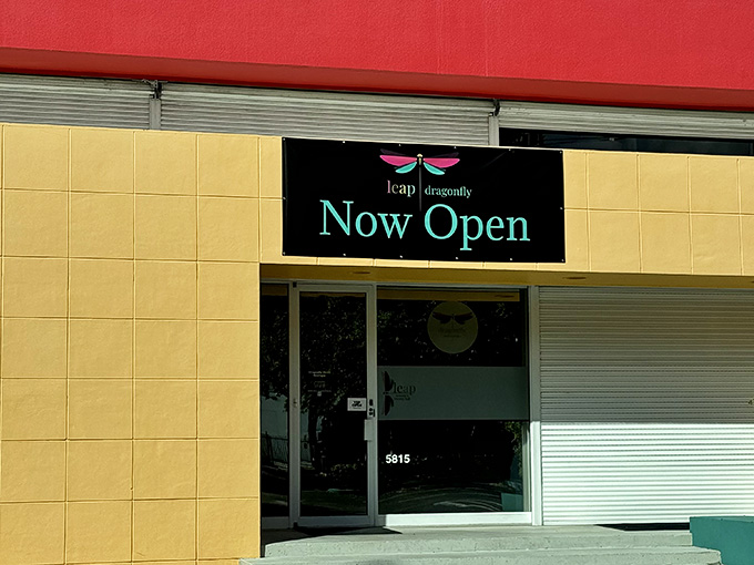 Sunshine bounces off those cheerful walls like nature's spotlight on your next great find waiting inside.