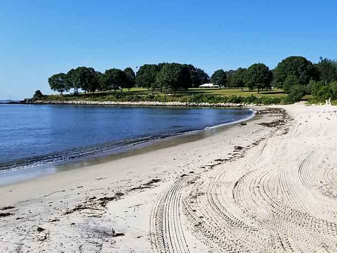 The curve of shoreline at Hole in the Wall Beach creates nature's perfect smile, inviting visitors to leave footprints and take memories.