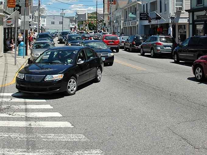 Main Street bustling with life, where every storefront whispers stories and your wallet gets nervous.