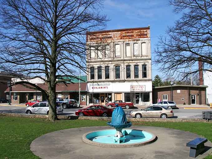 That turquoise fountain adds a splash of whimsy to a square where time moves at yesterday's pace.