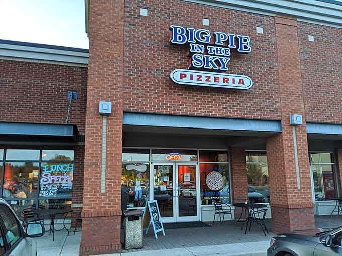 That brick facade and bold signage aren't just welcoming you in, they're preparing you for something magnificently oversized.