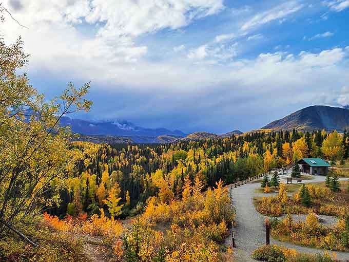 A visitor center nestled among fall foliage offers a perfect starting point for exploring the magnificent wilderness surrounding Matanuska Glacier.