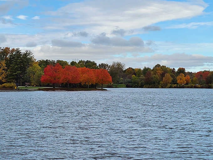 Fall transforms Seven Lakes State Park into a kaleidoscope of fiery colors reflecting perfectly on the tranquil waters.