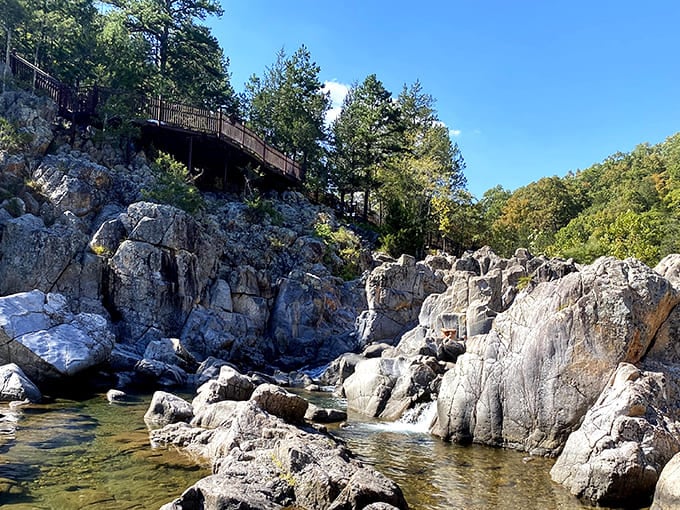 Ancient volcanic rock meets rushing water, creating nature's perfect playground where the Black River gets "shut in" by billion-year-old formations.