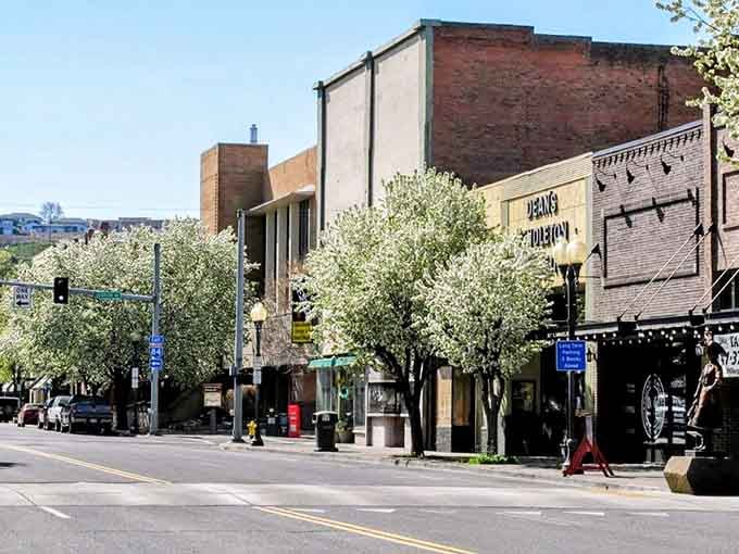 Spring brings flowering trees to downtown Pendleton, softening brick buildings with nature's touch &ndash; proof that Mother Nature decorates better than any interior designer.