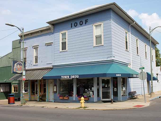 That blue building isn't just charming, it's practically begging you to slow down and explore its treasures.