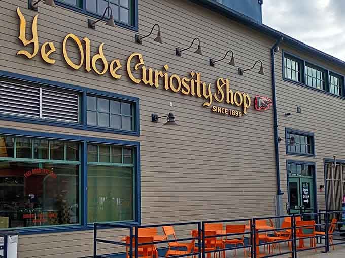 That golden lettering gleaming against weathered wood promises adventures that defy explanation inside.